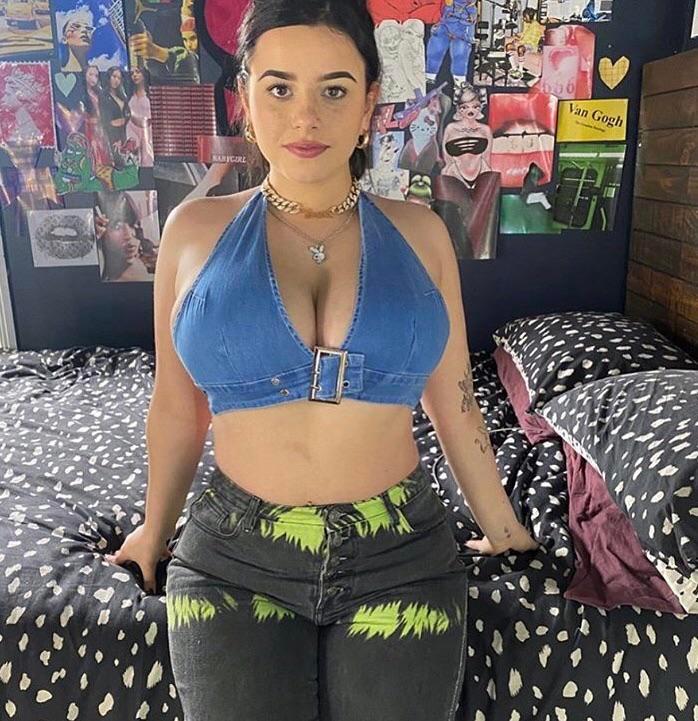 Her breasts just explode from her chest. | Scrolller