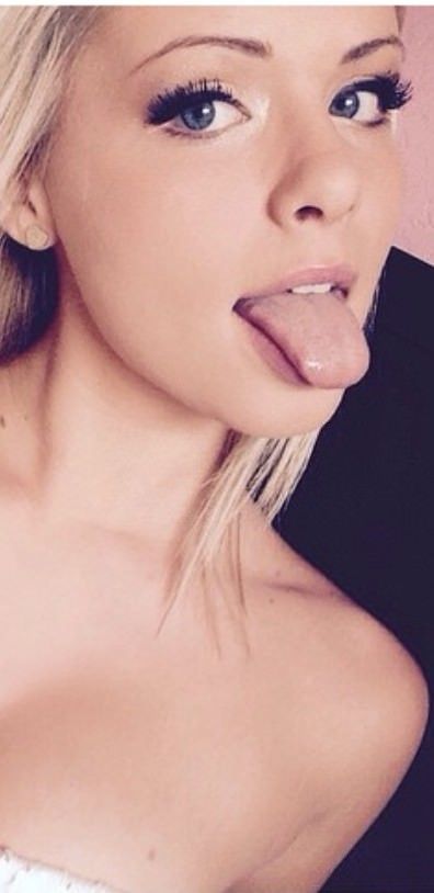 Her tongues out | Scrolller