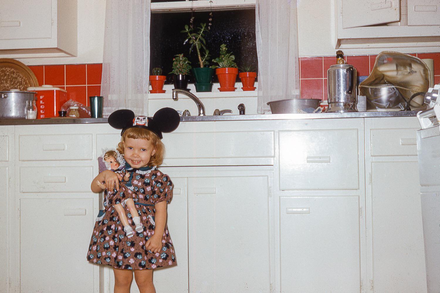 Here is my aunt as a child back in the late 1950s sporting her Mickey Mouse ears! | Scrolller