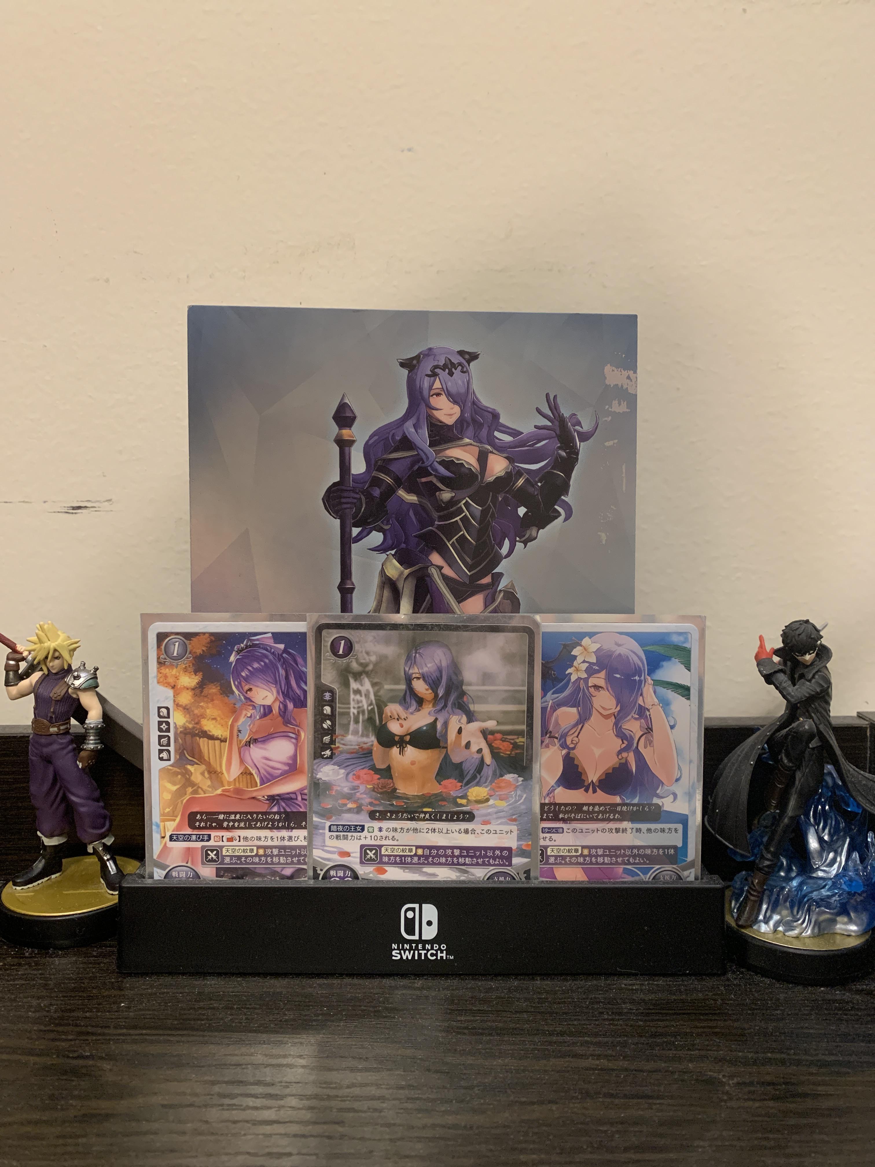 Here’s my Camilla shrine on my desk! 💜 (feat. Cloud and Joker as guards lol) | Scrolller