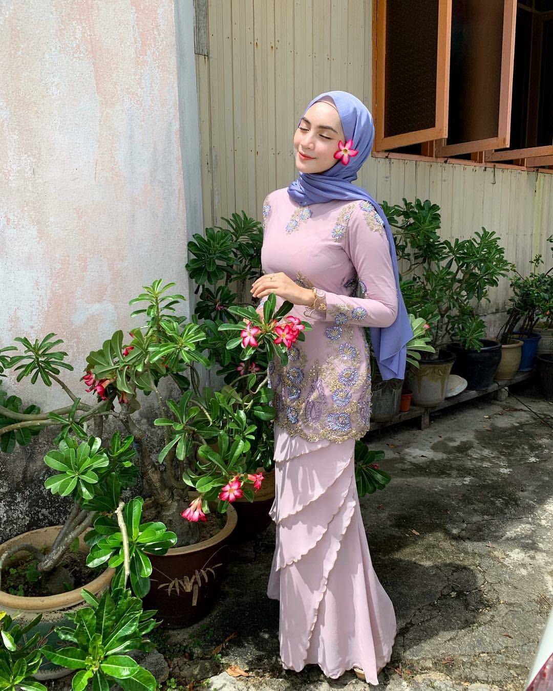 Hijabi in a modern traditional dress. | Scrolller