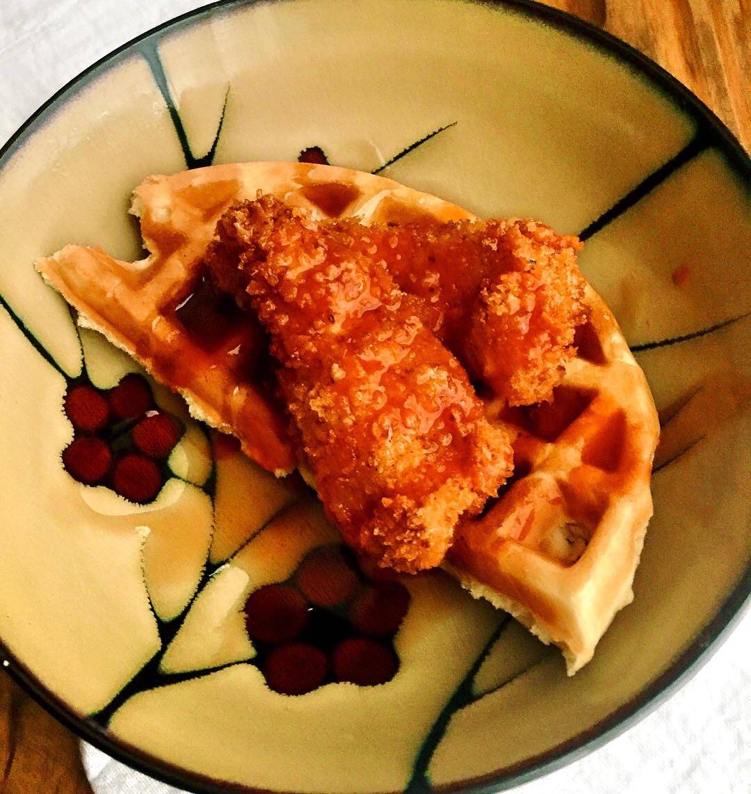 Homemade chicken and waffles with syrup and a drizzle of Texas Pete hot sauce | Scrolller