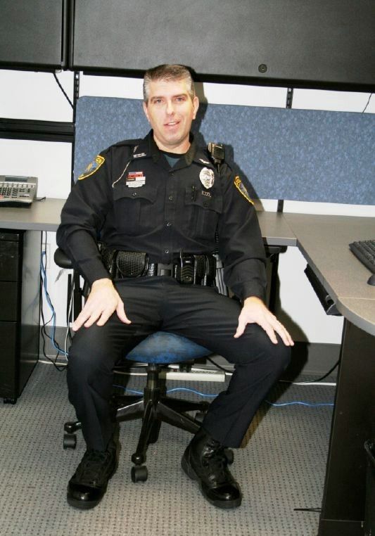 Hot cop sitting with his legs spread (would love to get between them) | Scrolller
