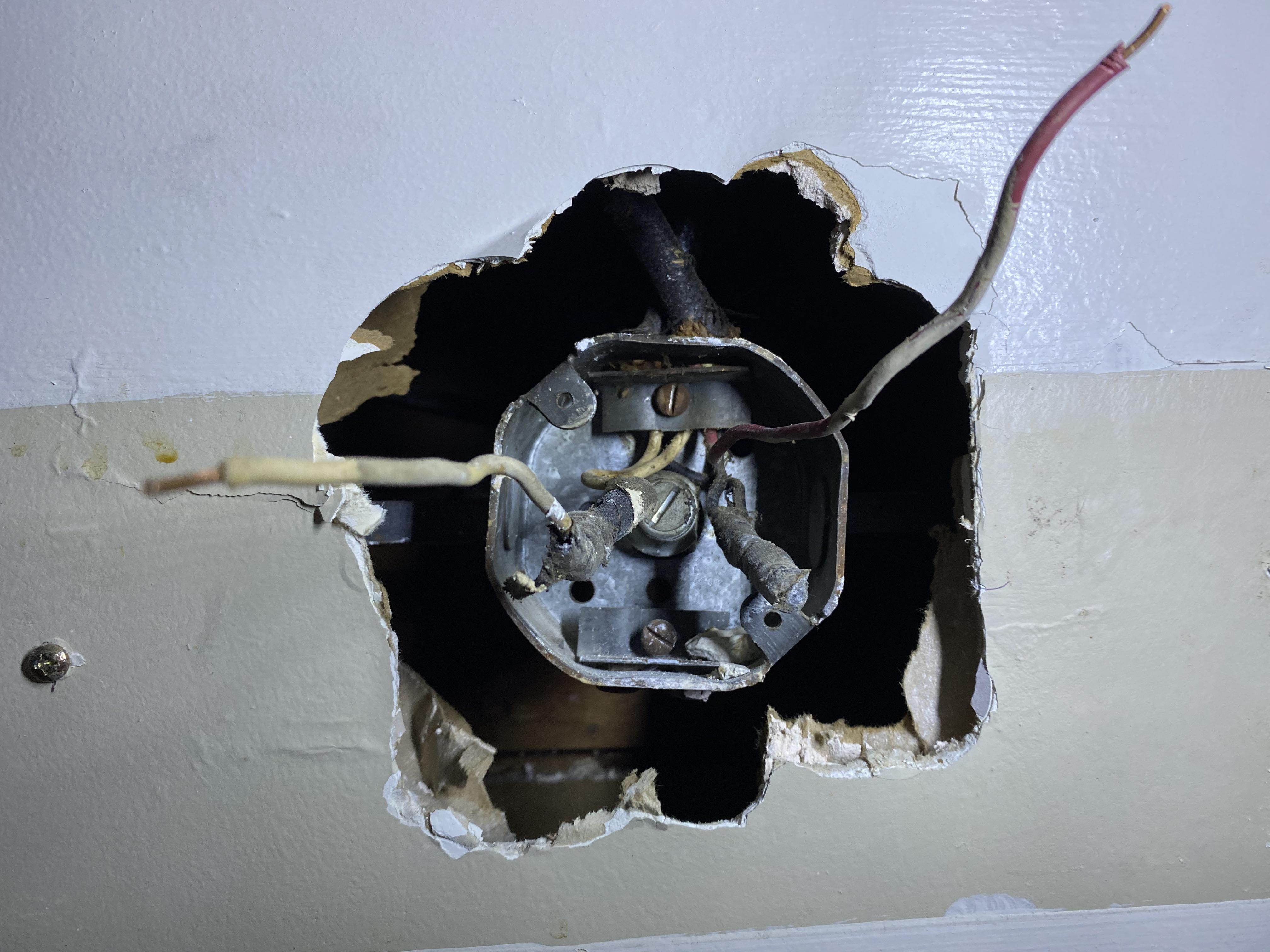 House built in 1952 electric box hidden behind drywall with burnt wires joined wiring... Can I ...