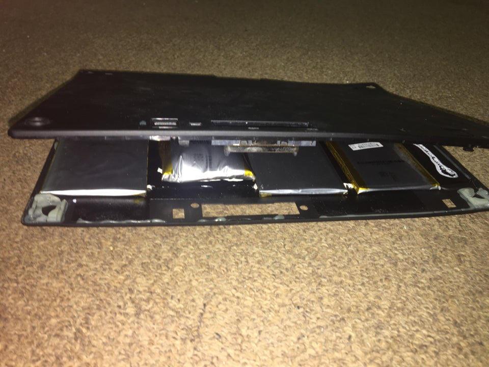 HP external laptop battery a customer pulled out a cupboard. | Scrolller
