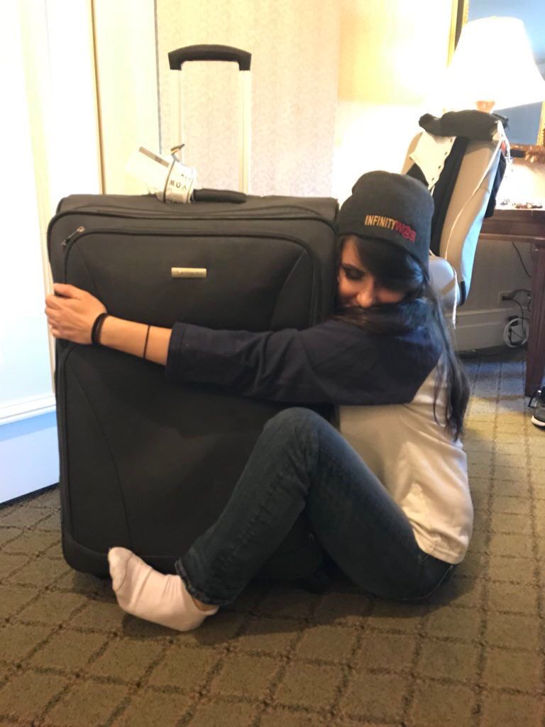 Hugging Suitcase | Scrolller
