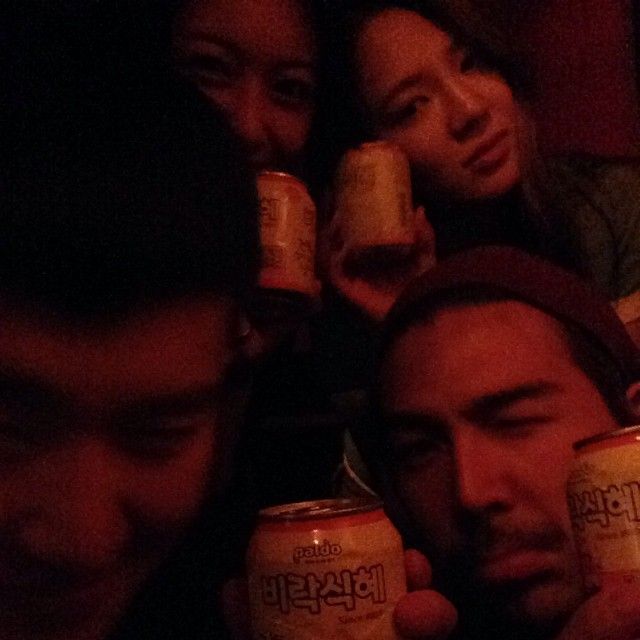 Hyoyeon and friends pose with soda (?) cans | Scrolller