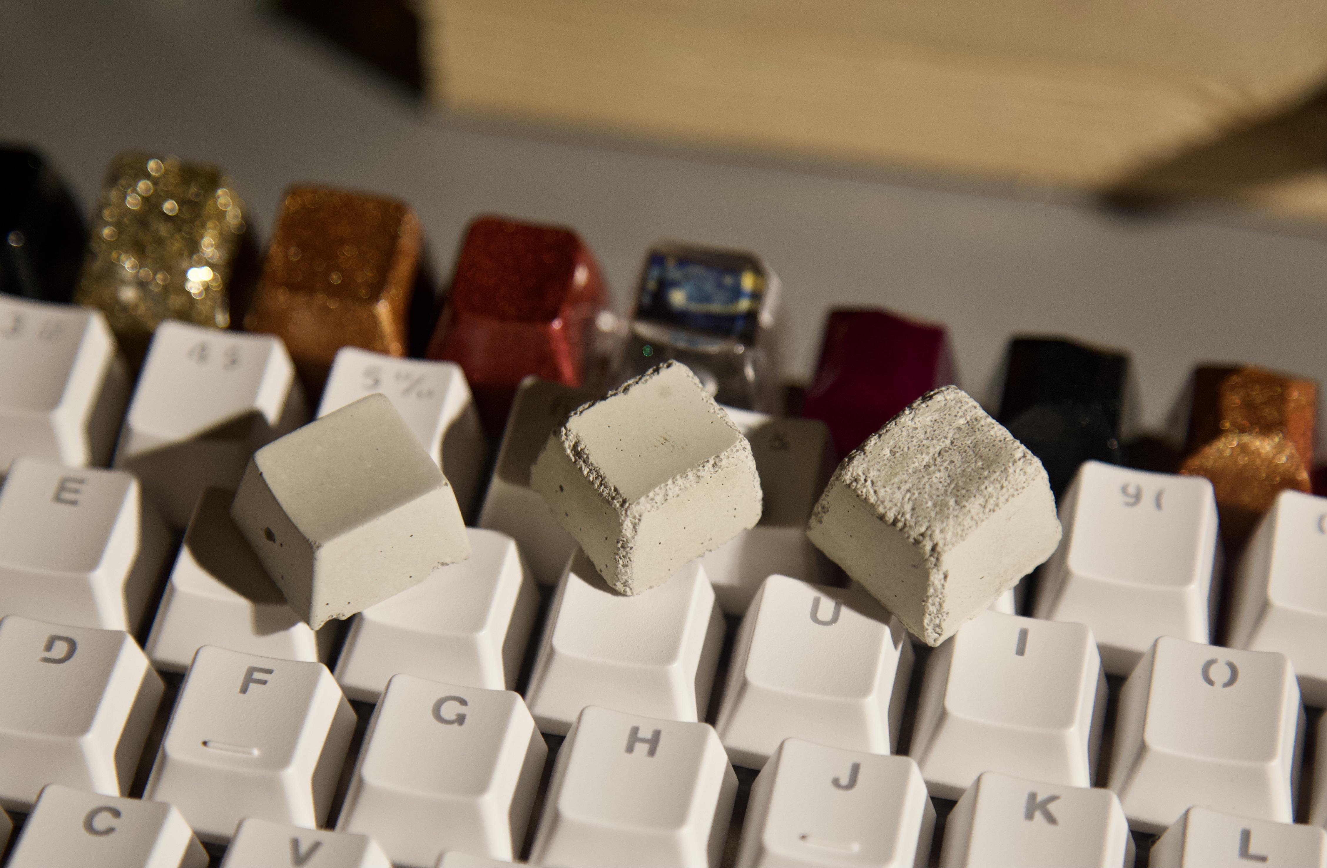I made a few cement keycaps. | Scrolller