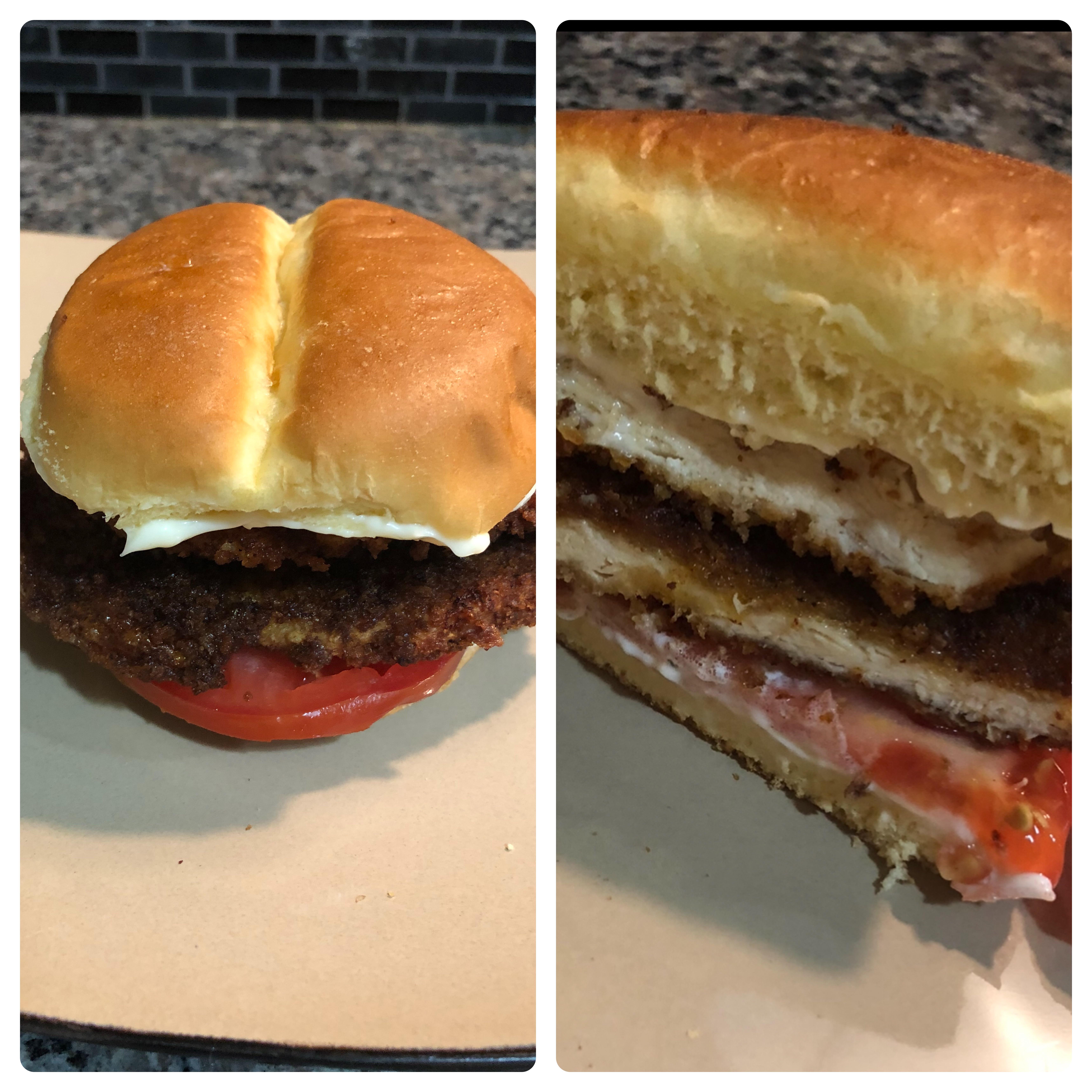 [I made] Crispy chicken sandwich with mayonnaise and tomatoes on a toasted Hawaiian sweet bun ...