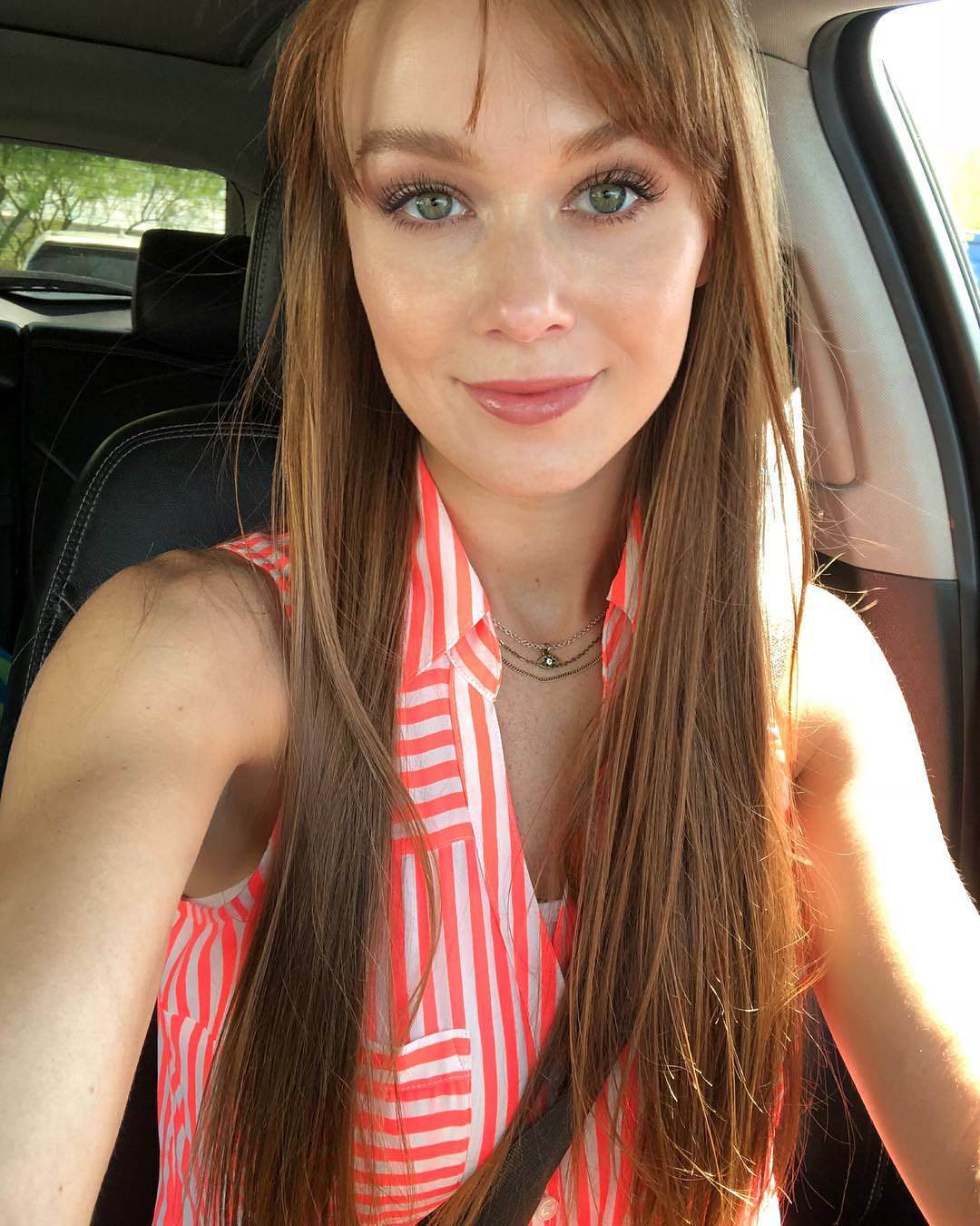 In her car | Scrolller