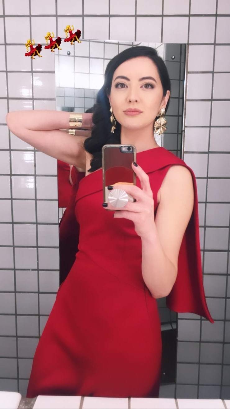 Jane Douglas in a red dress. | Scrolller