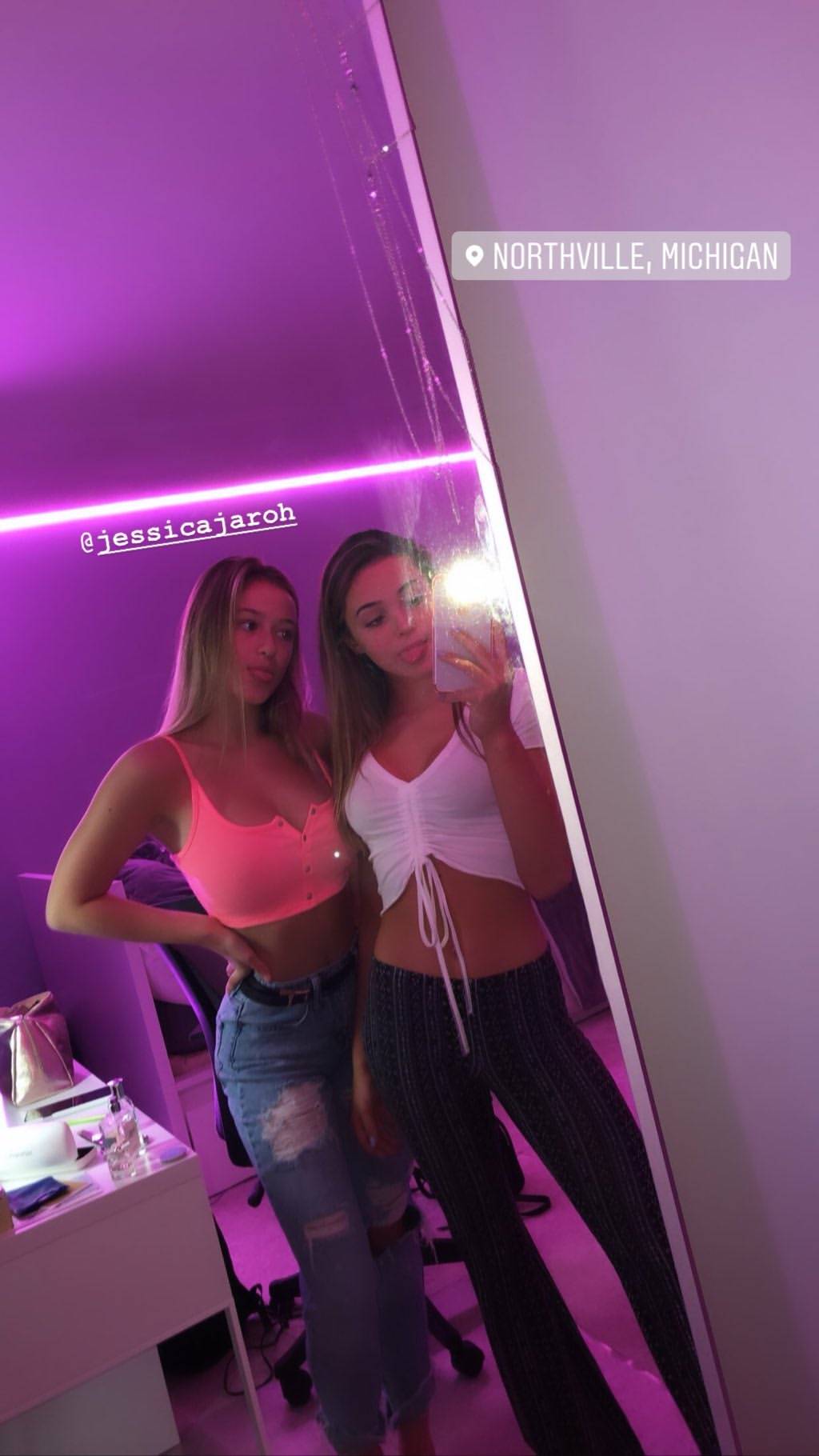 Jessica and Livvy infront of the mirror | Scrolller