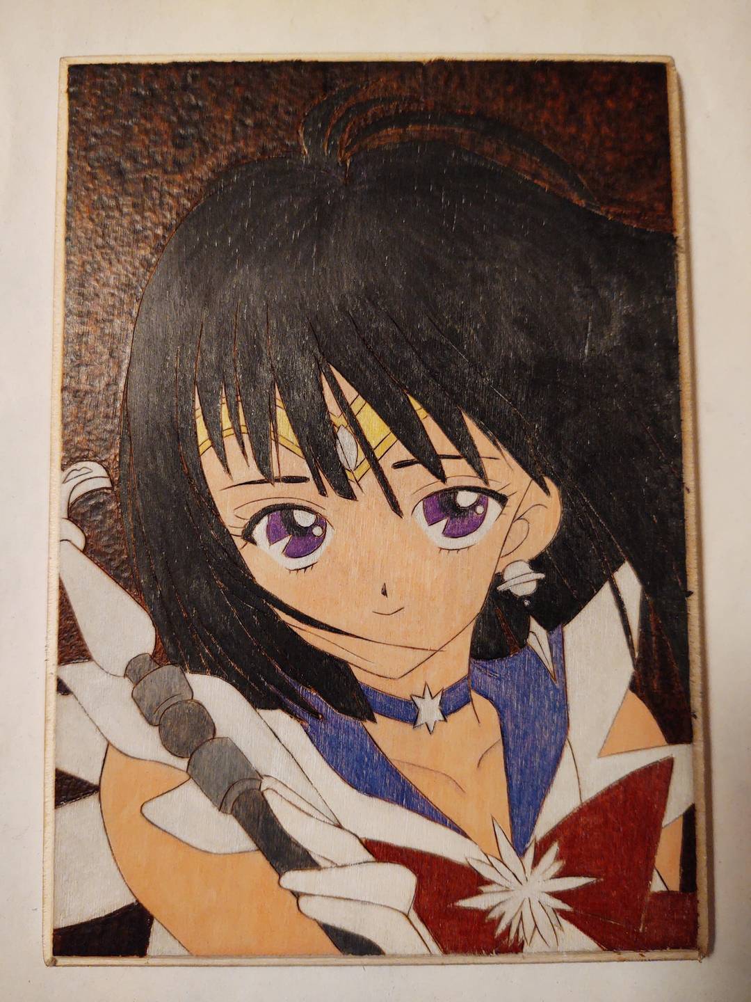 Just finished coloring Sailor Saturn 😁😁🖤💜 I love doing mixed media pyrography 🖤 | Scrolller
