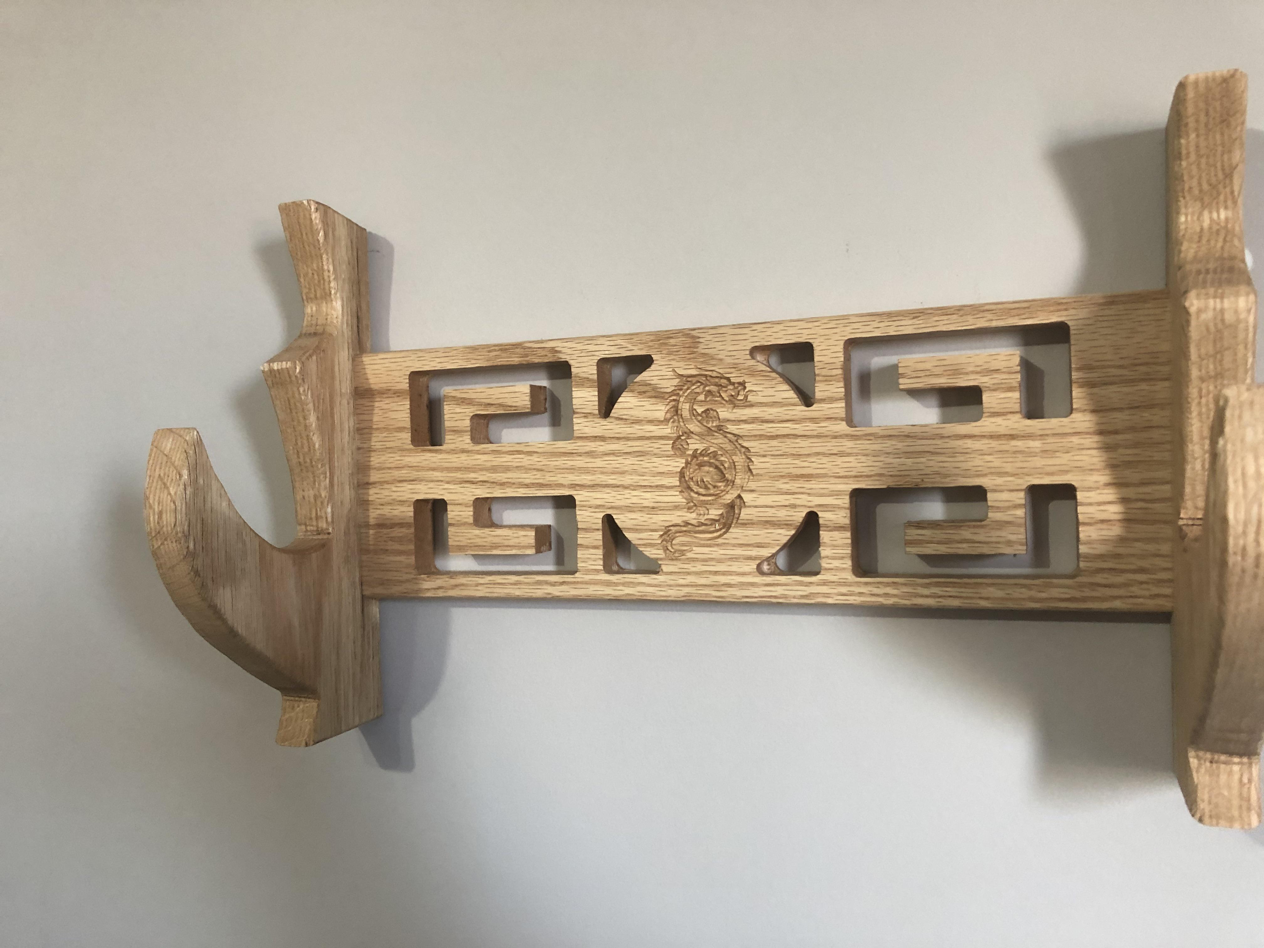 Katana wall mount I made for my construction class | Scrolller
