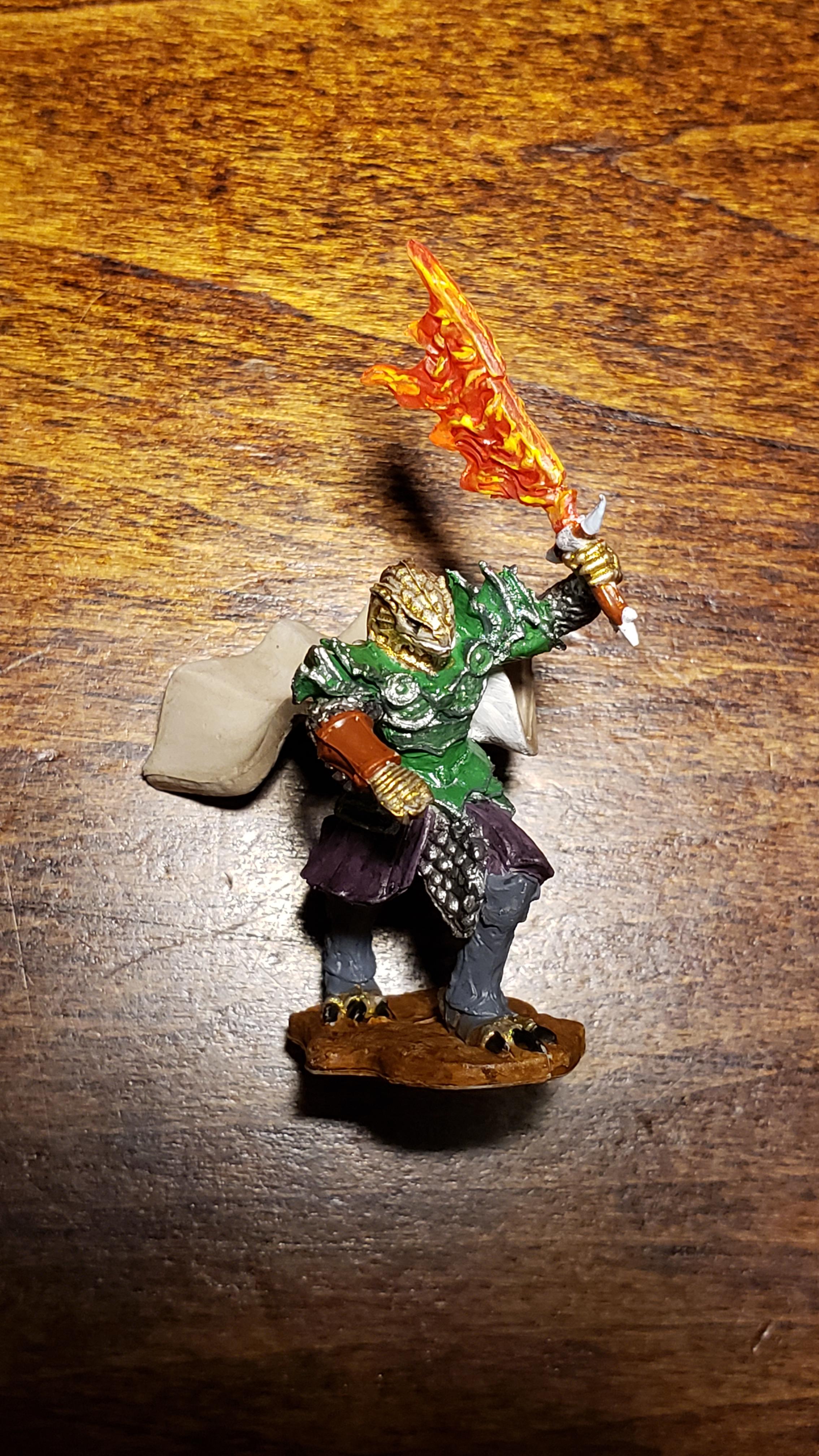 Kriv, gold dragonborn paladin of Bahamut. | Scrolller