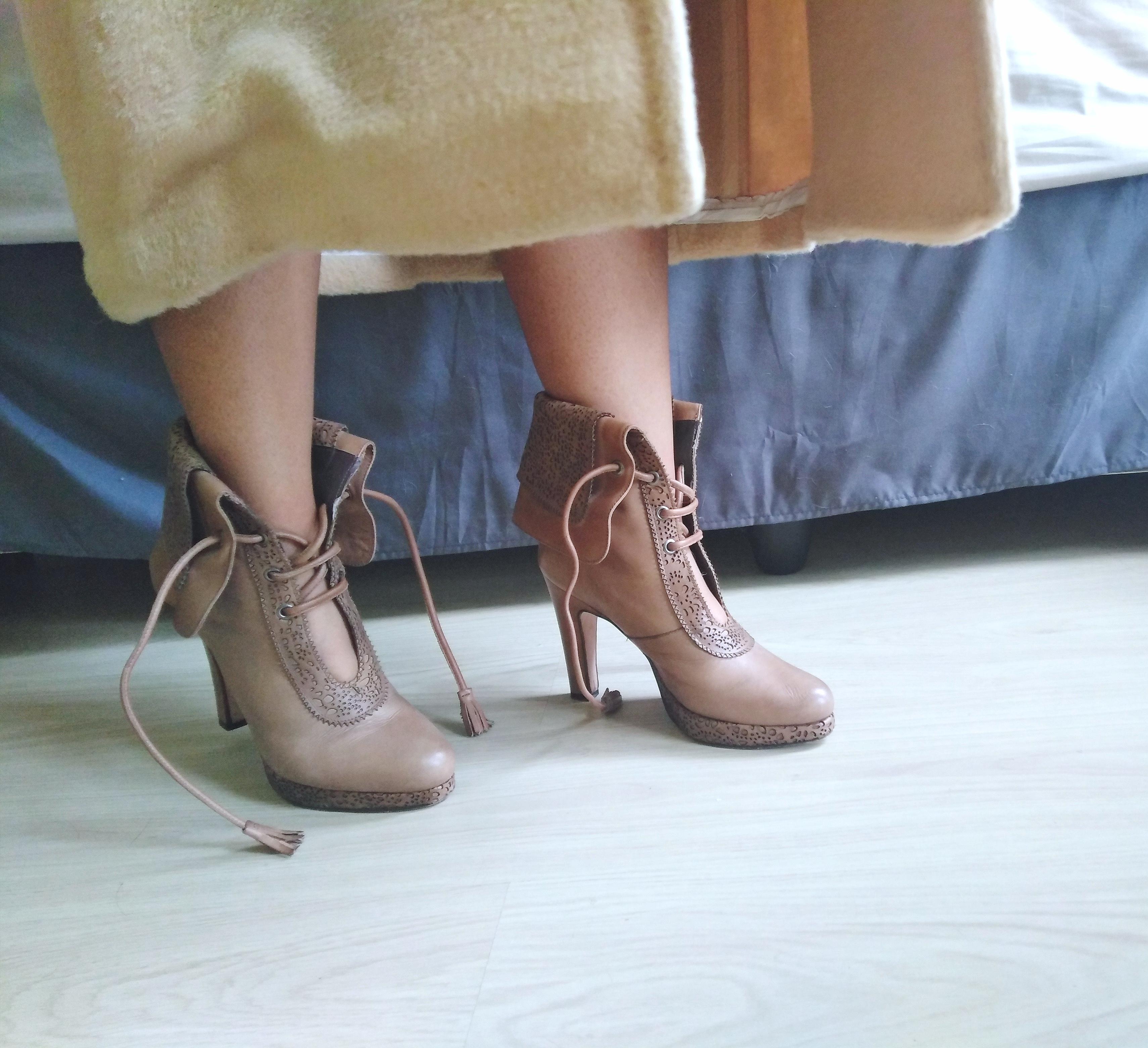 Lace ups and a long coat | Scrolller