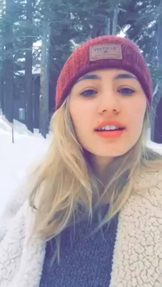 Lia Marie Johnson catching snowflakes with her tongue [gifv] | Scrolller