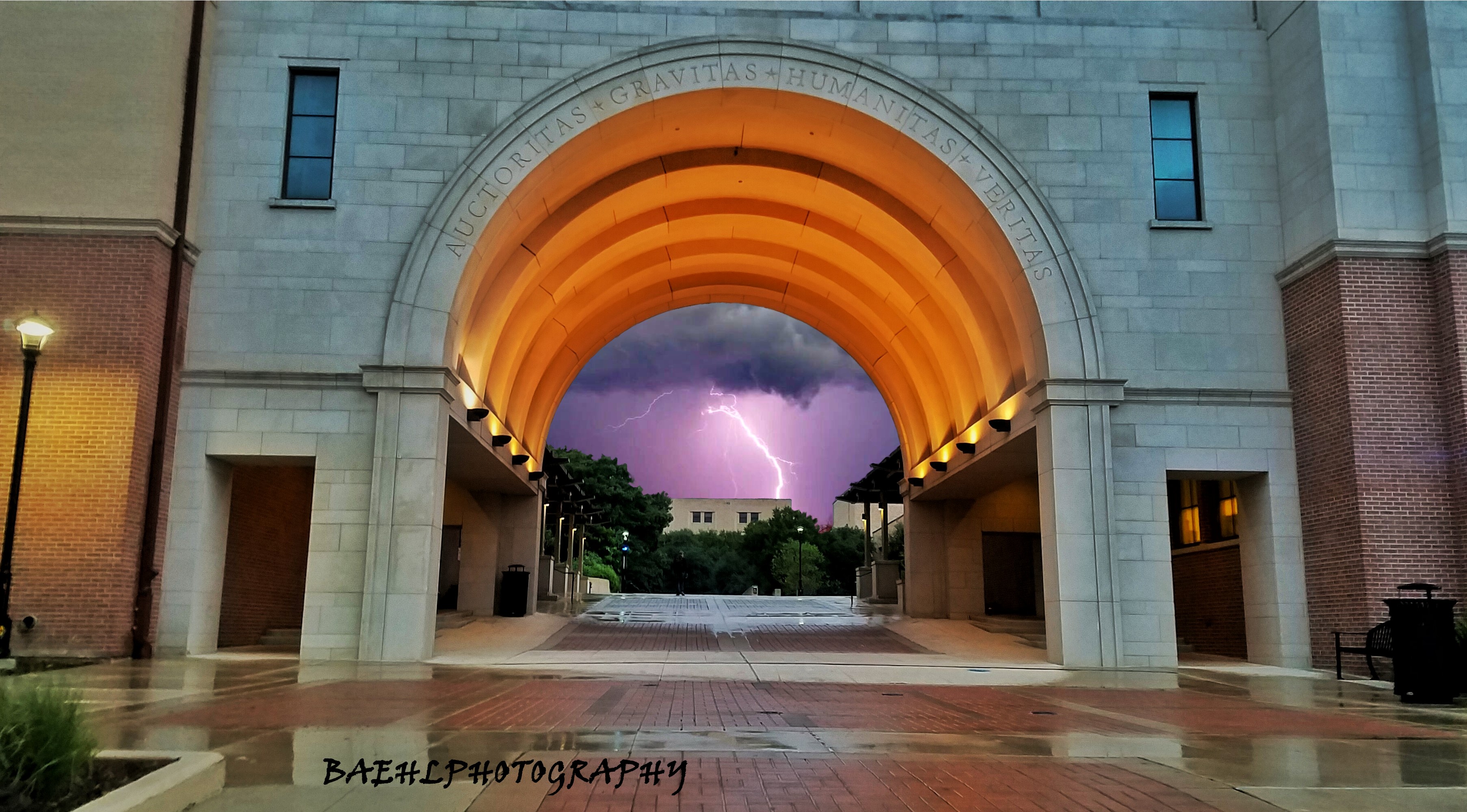 Lightning behing Arch at Texas State [3612x2000] [OC] | Scrolller