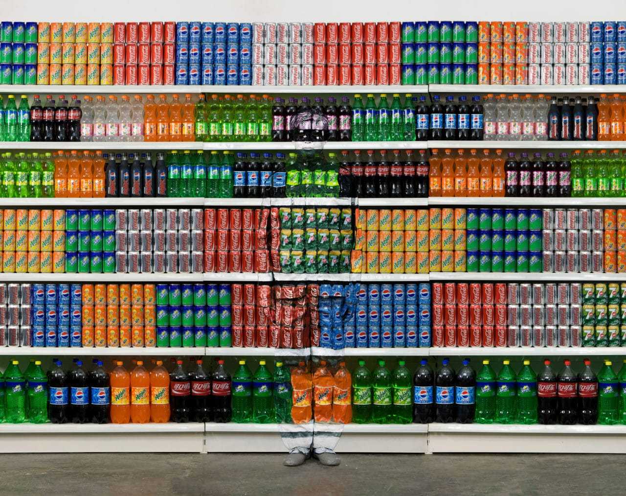 Liu Bolin, a Chinese artist who paints himself to blend into the setting | Scrolller