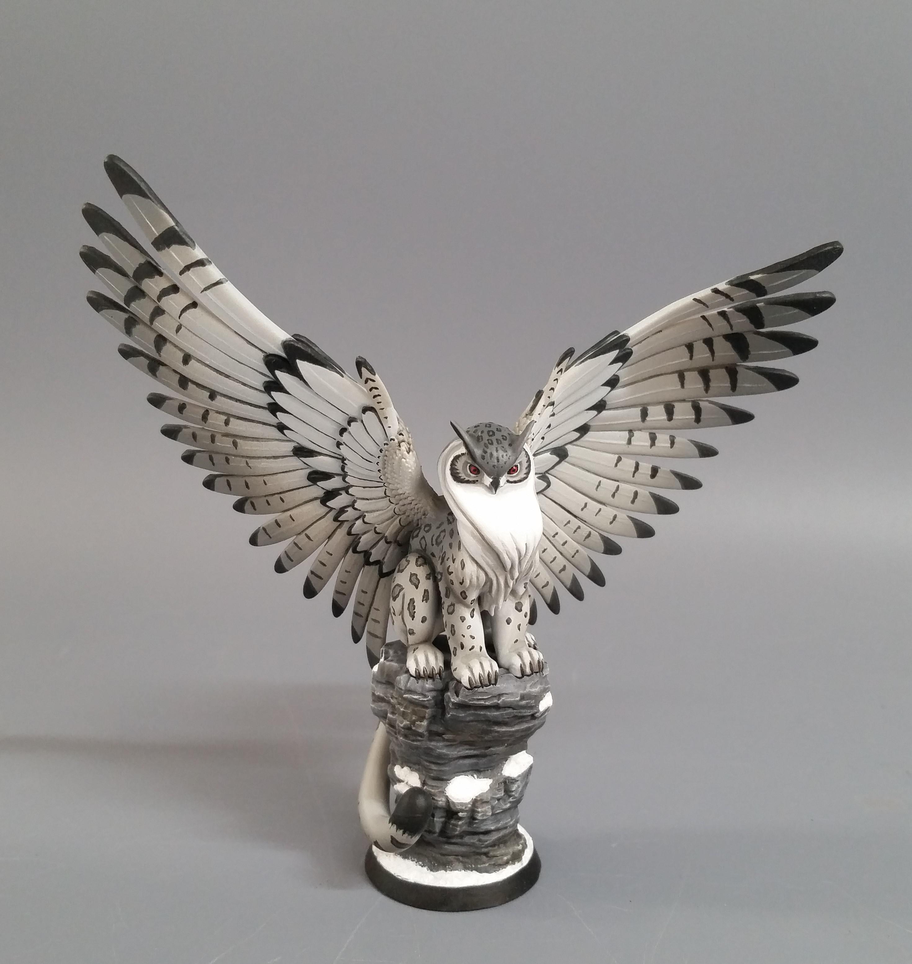 Meet Fluffy; the especially cuddly (in a "rip your face off" kind of way) Owl Gryphon | Scrolller