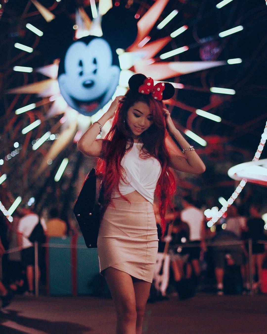 Mickey looked down and smiled | Scrolller