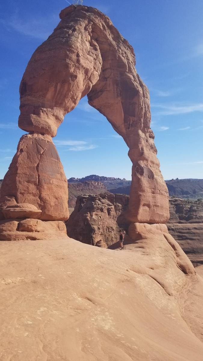 Mom for scale at Delicate Arch | Scrolller