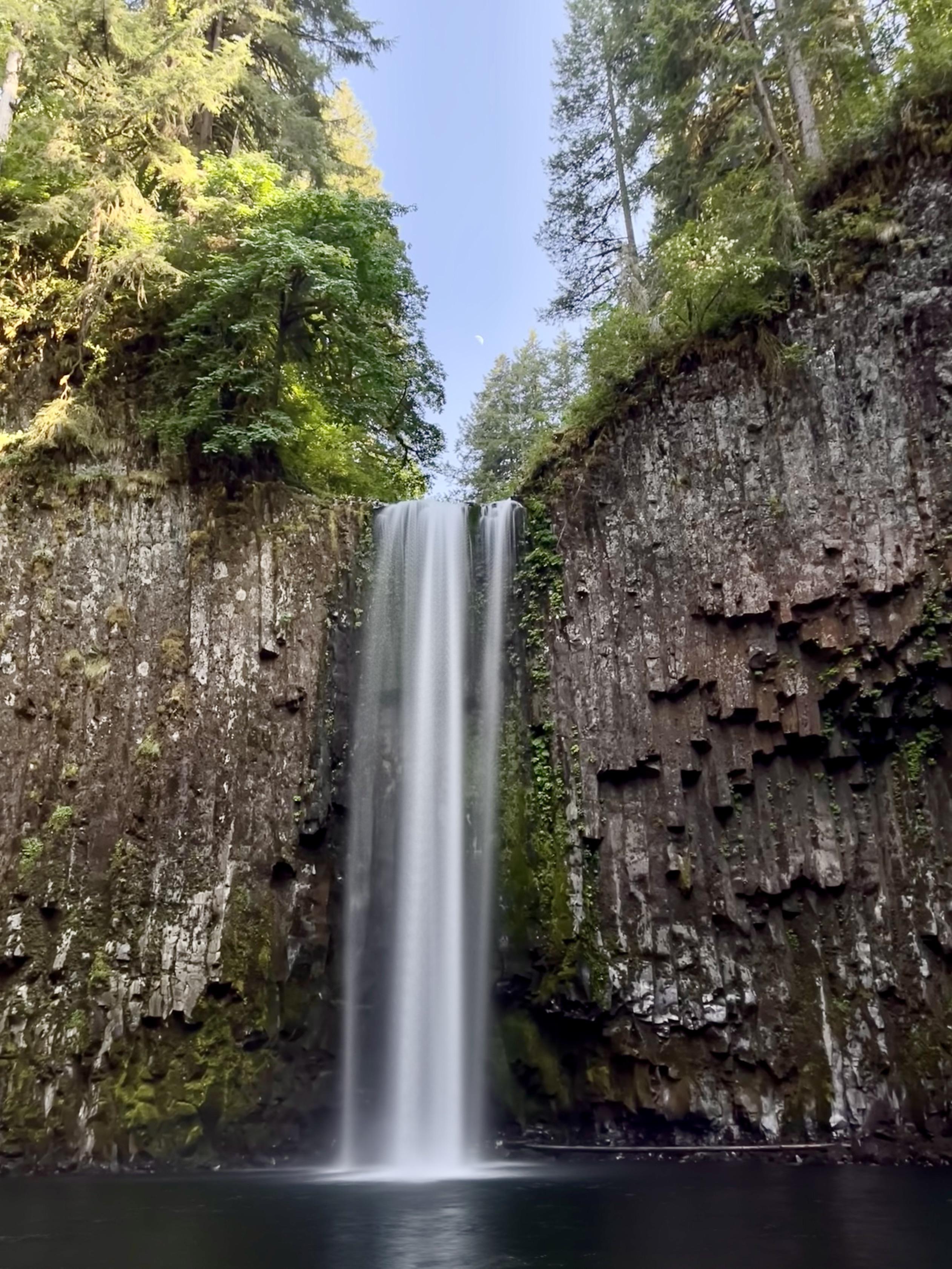 Moon lined up nice between the falls. | Scrolller