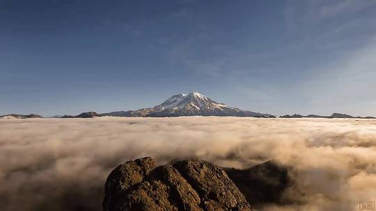 Mount Rainier in a sea of clouds. | Scrolller