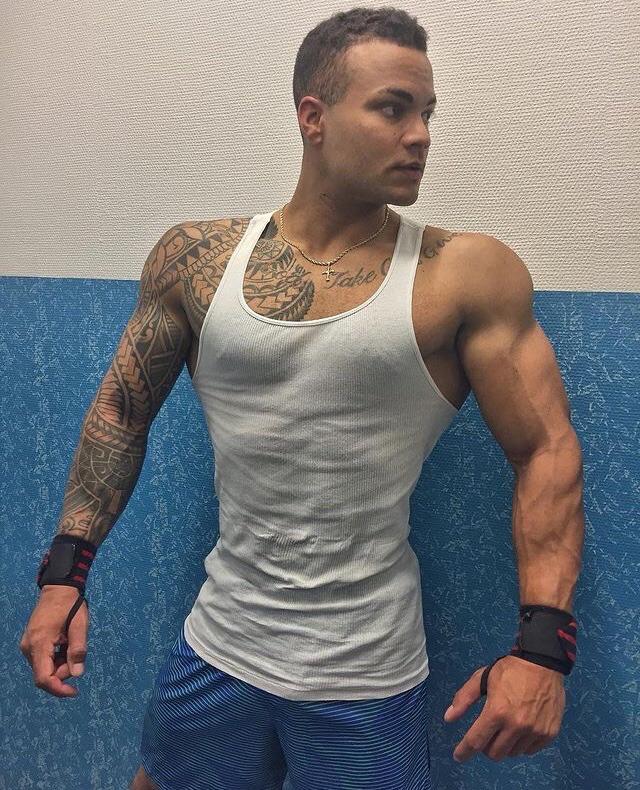 “Muscle in white tank” … | Scrolller