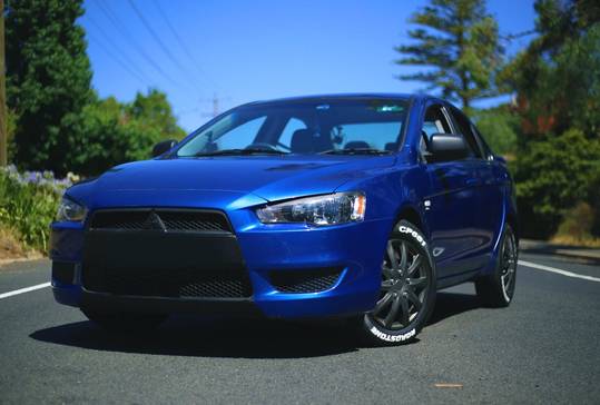 My 09 Lancer, still rockin steelies but it’s coming along. | Scrolller