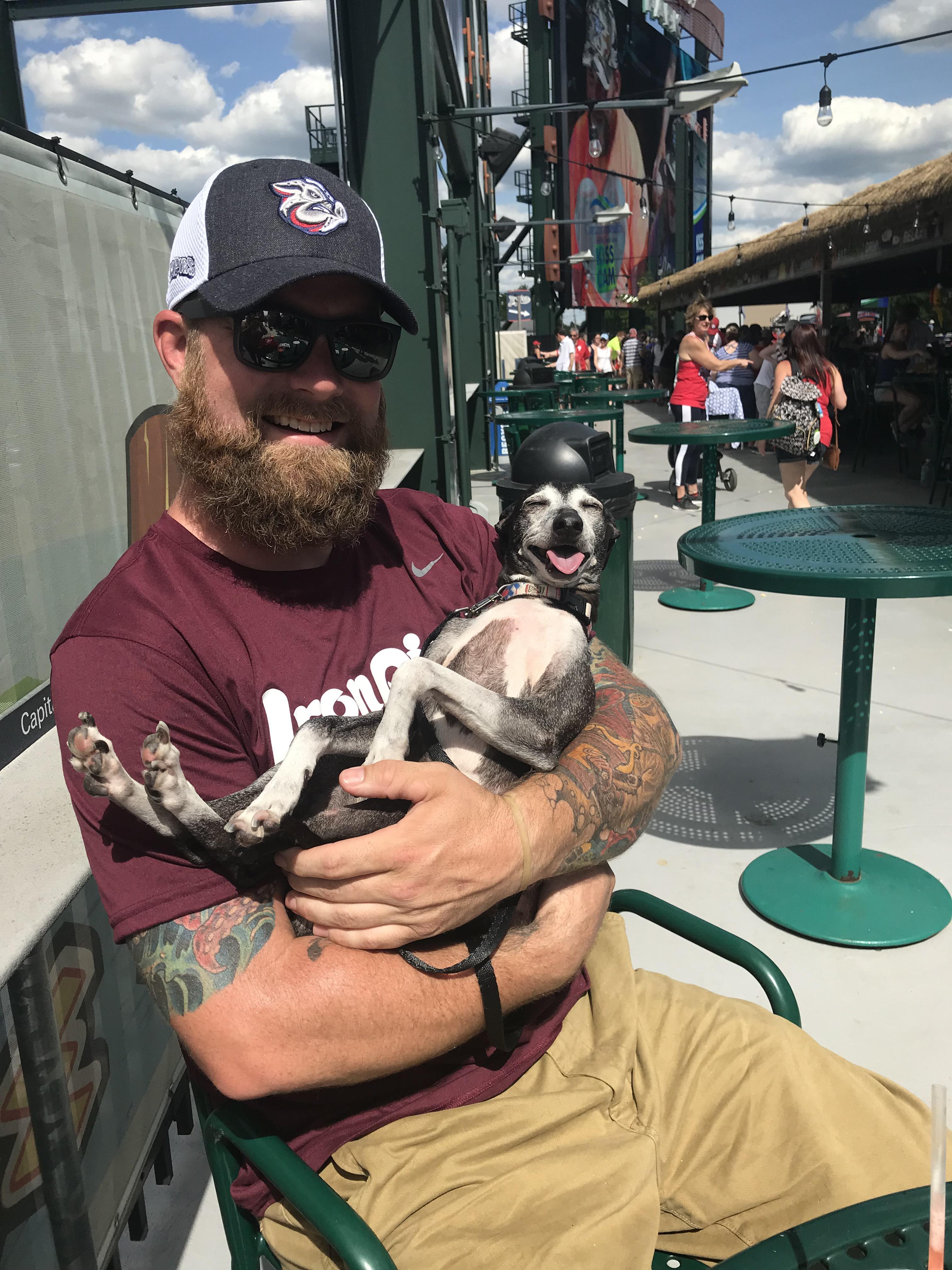 My buddy smiling at the ballpark. | Scrolller