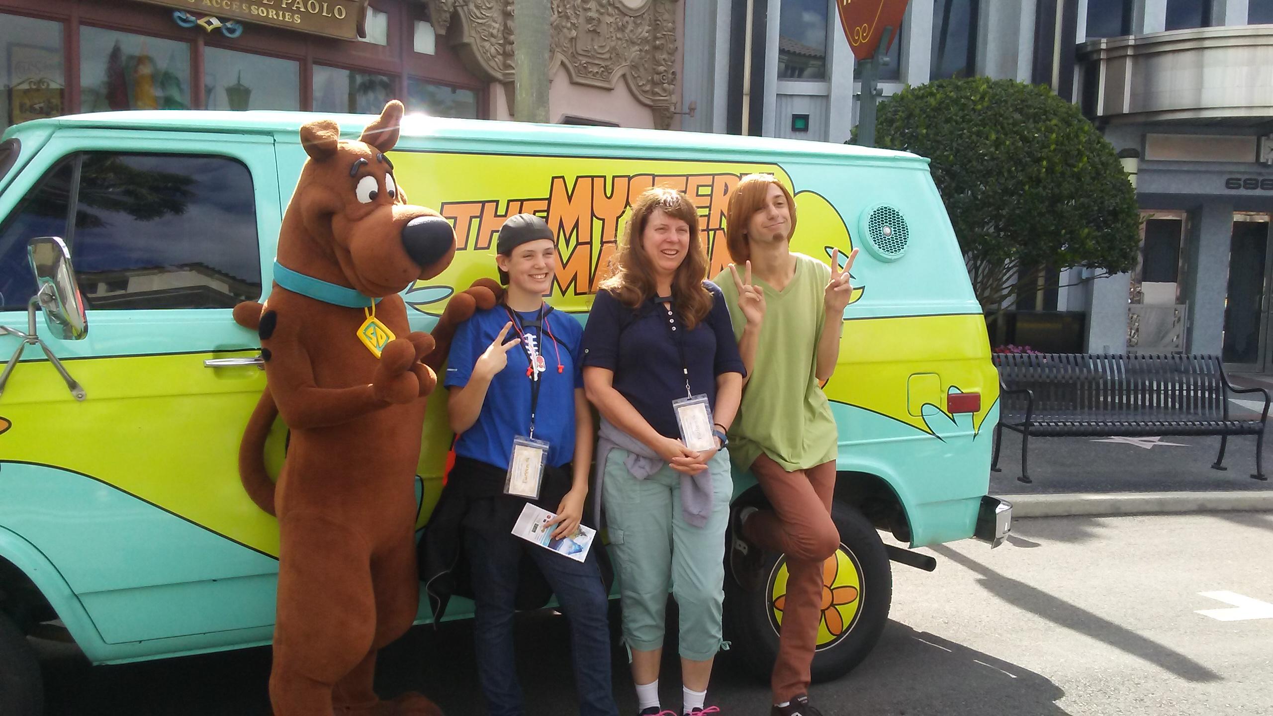 My mom and sister beside scooby doo. | Scrolller