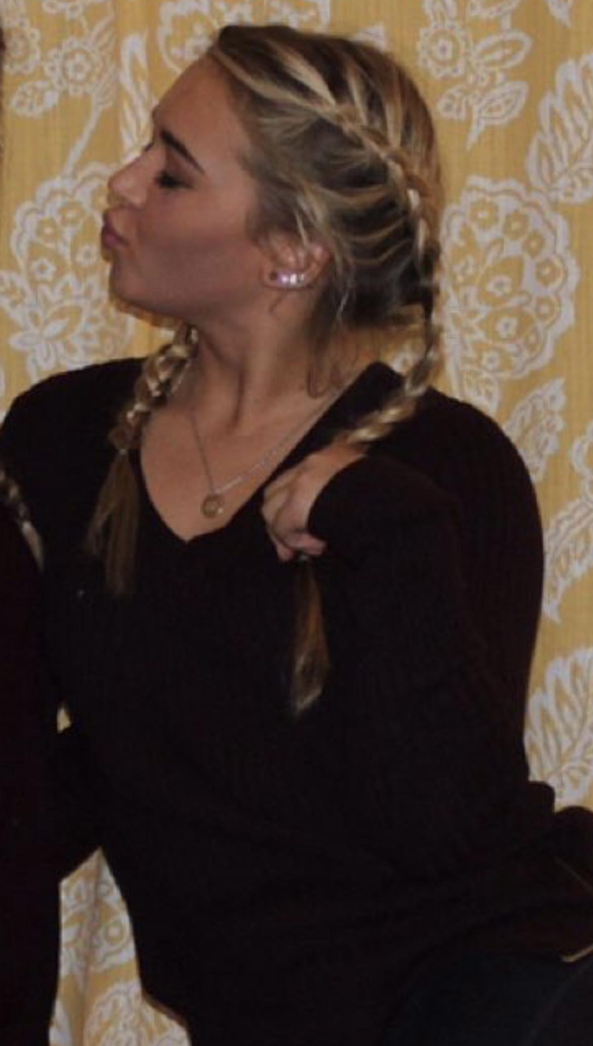 Natalie Decker with two blonde braids | Scrolller