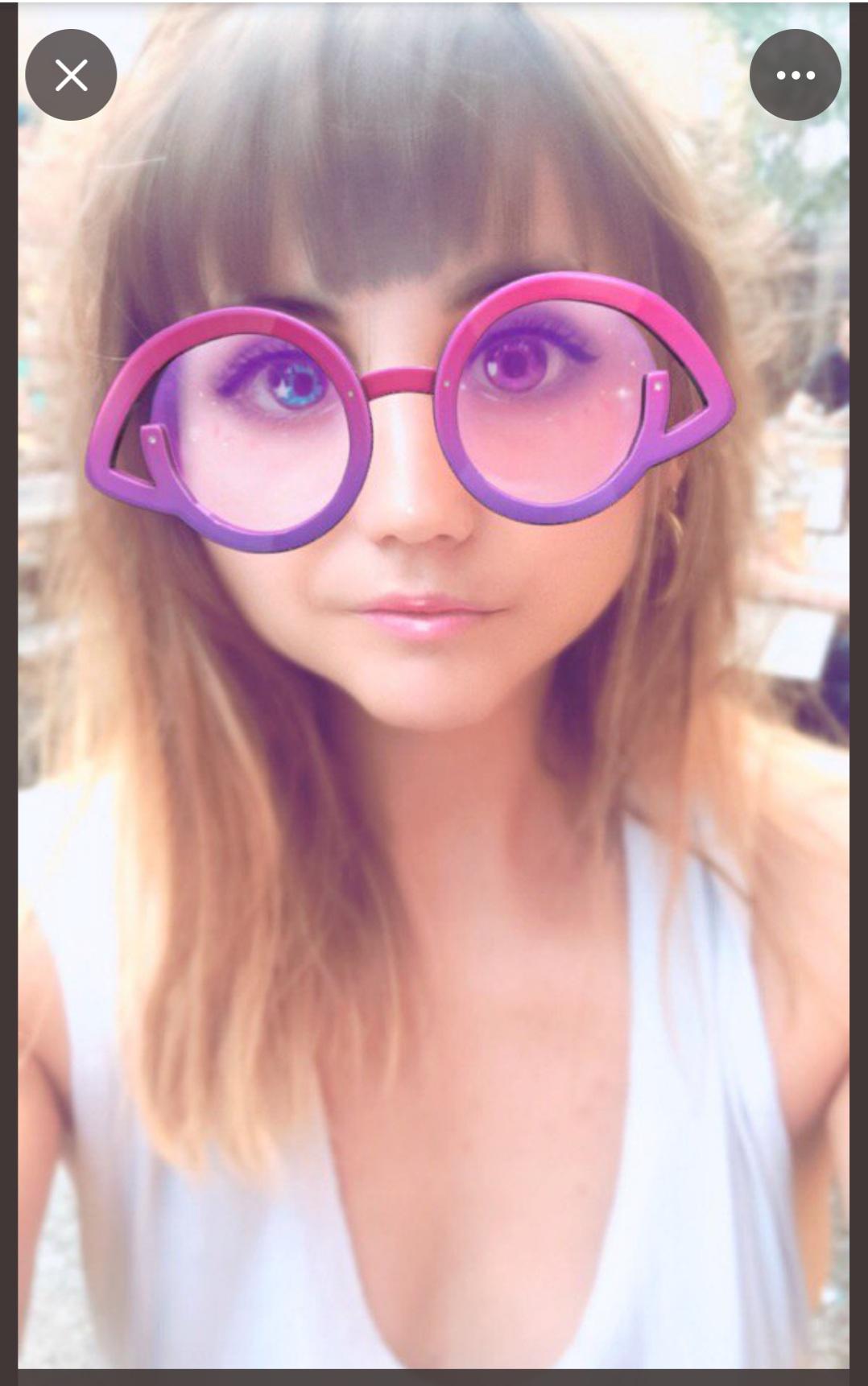 Natasia Demetriou playing with filters on Twitter back when her account was active. Looking ...