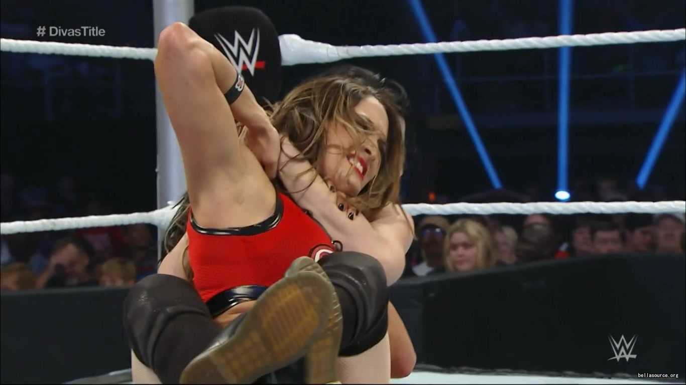 Paige choking Nikki Bella | Scrolller