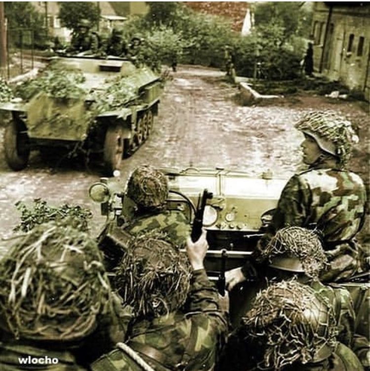 Panzergrenadiere (mechanized infantry) of the Panzer-Lehr-Division in a town in Normandy. France ...