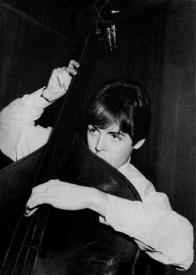Paul playing a double bass | Scrolller