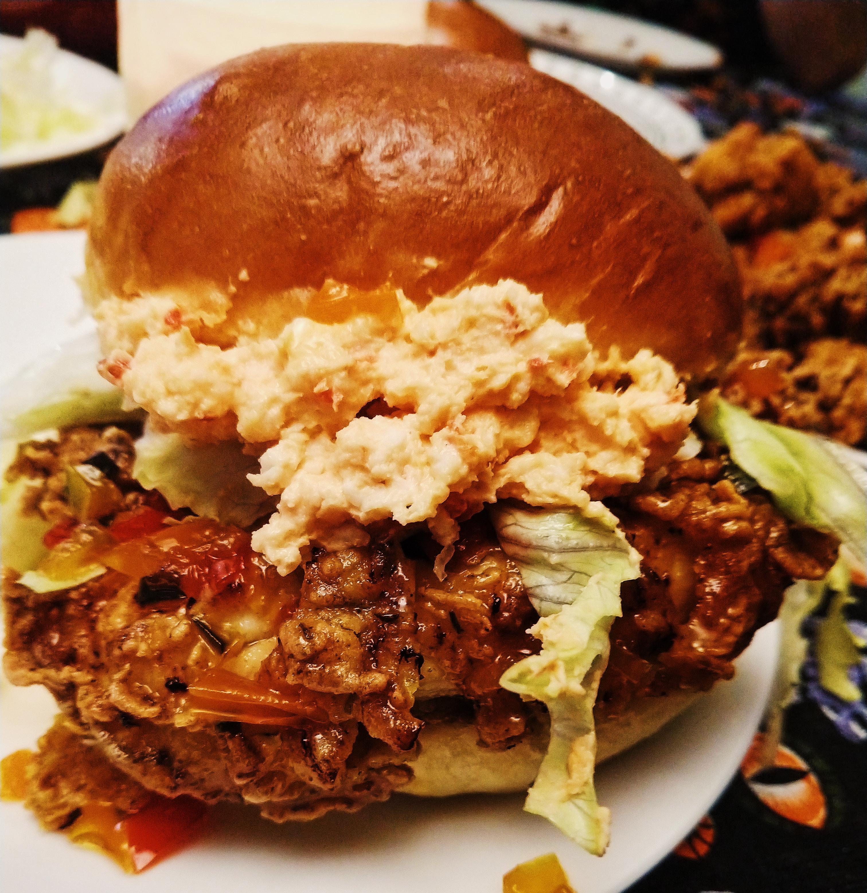 Pepper jelly glazed fried chicken, pimento cheese, and iceburg lettuce on homemade buns! | Scrolller
