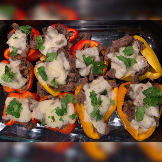 Philly Cheesesteak stuffed peppers with cilantro garnish! Made these for dinner! | Scrolller