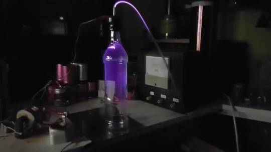 Plasma in a Vacuum Chamber - 18kV 400W | Scrolller