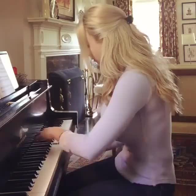 Playing piano | Scrolller