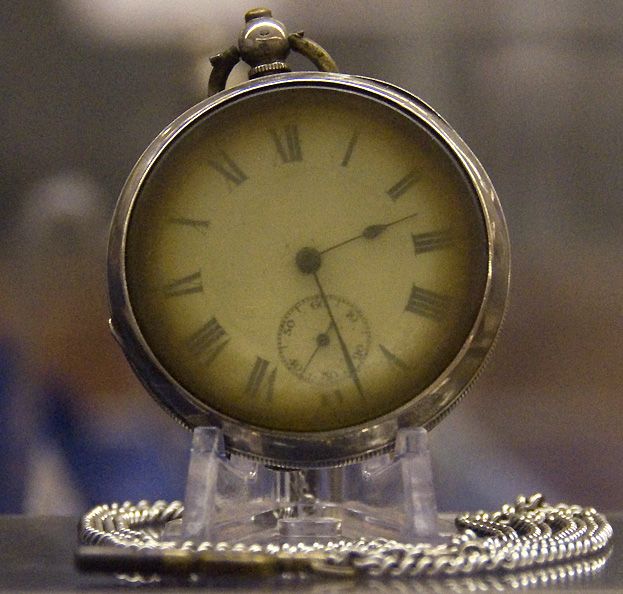 Pocket watch retrieved from the wreck site, stopped showing a time of 2:28. | Scrolller