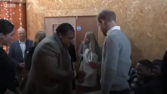 Prince Harry gets taught a handshake | Scrolller