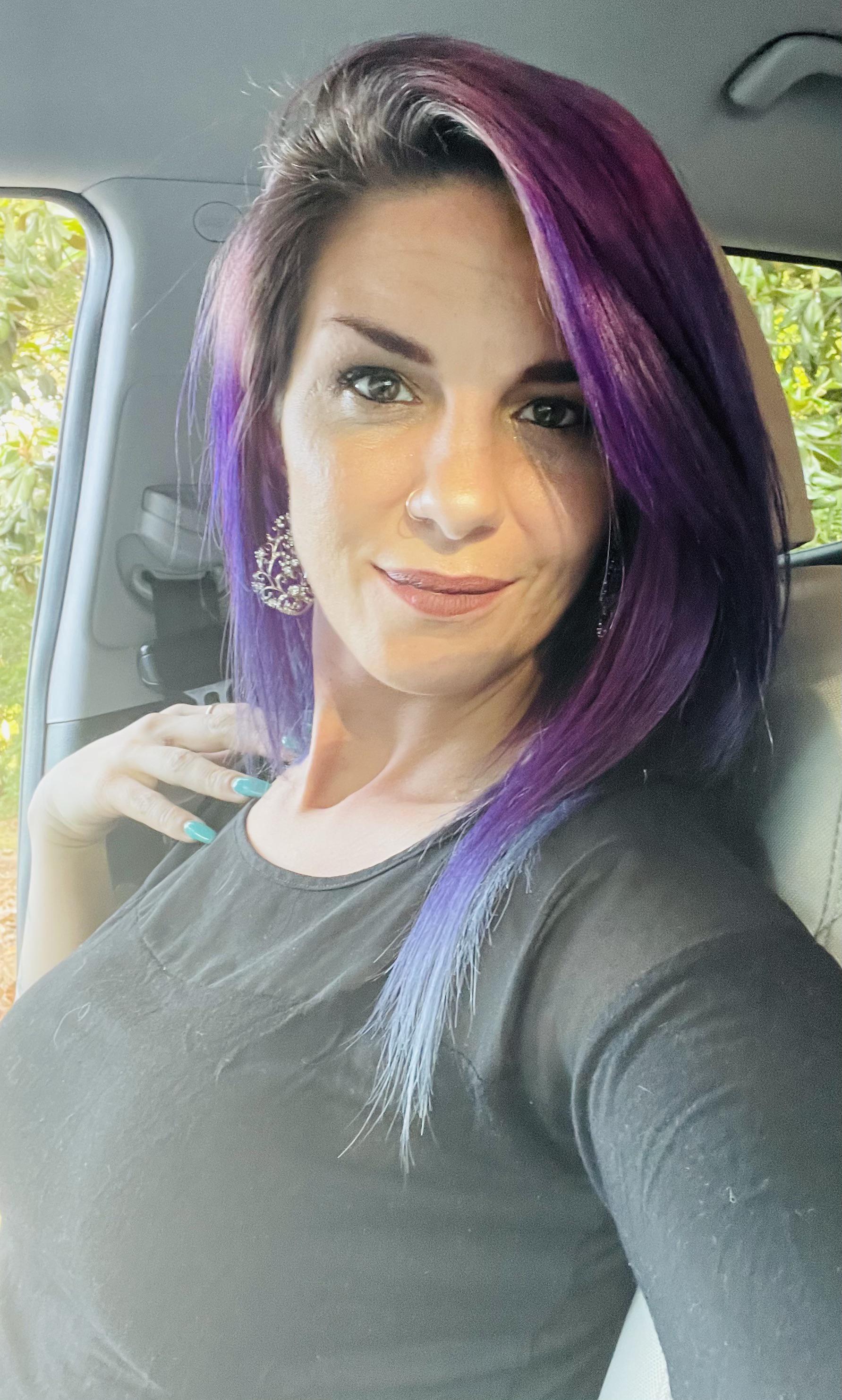 Purple haired woman | Scrolller