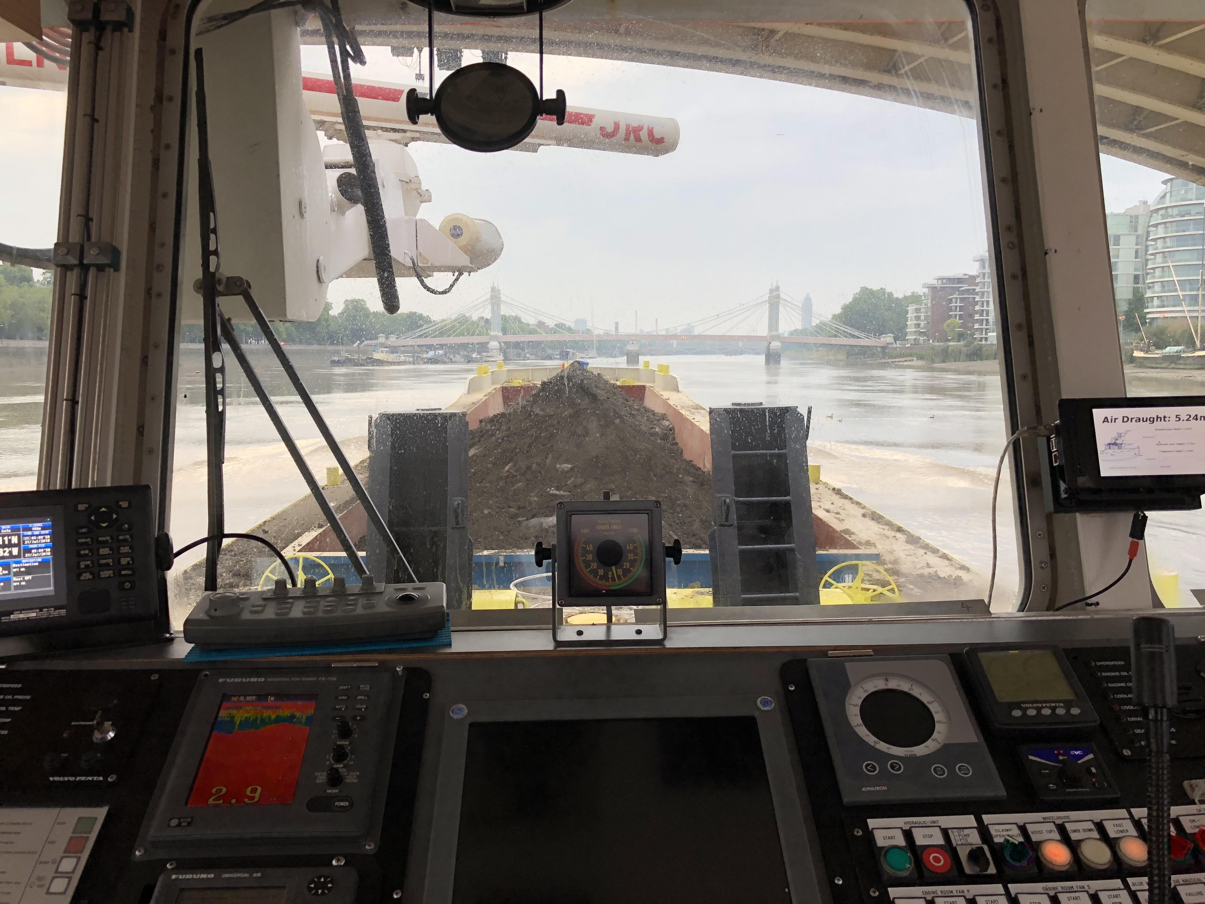 Pushing one, outward bound, Battersea road bridge. | Scrolller