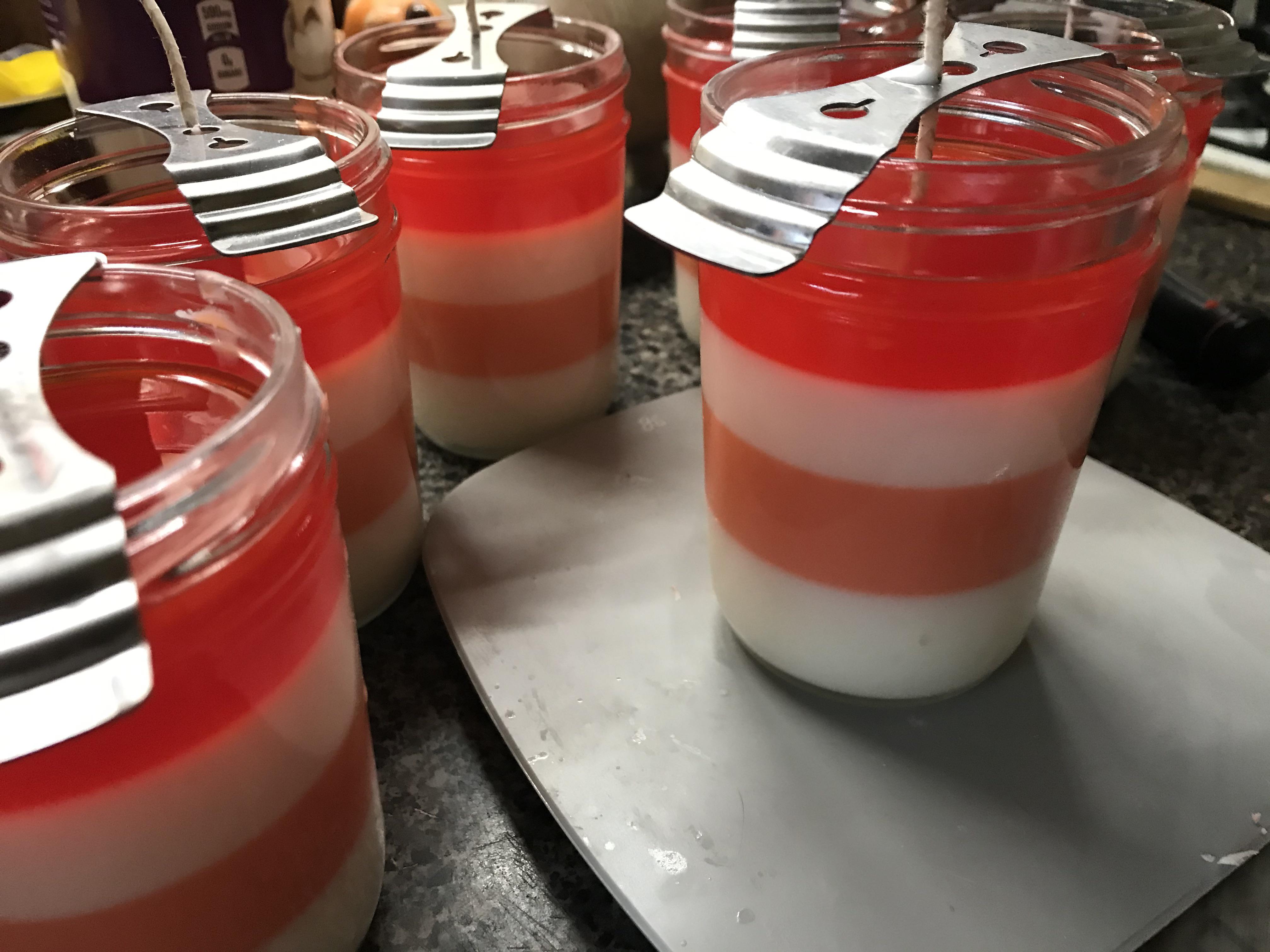 Putting the final layer on my Candy Cane Christmas Tree candles | Scrolller
