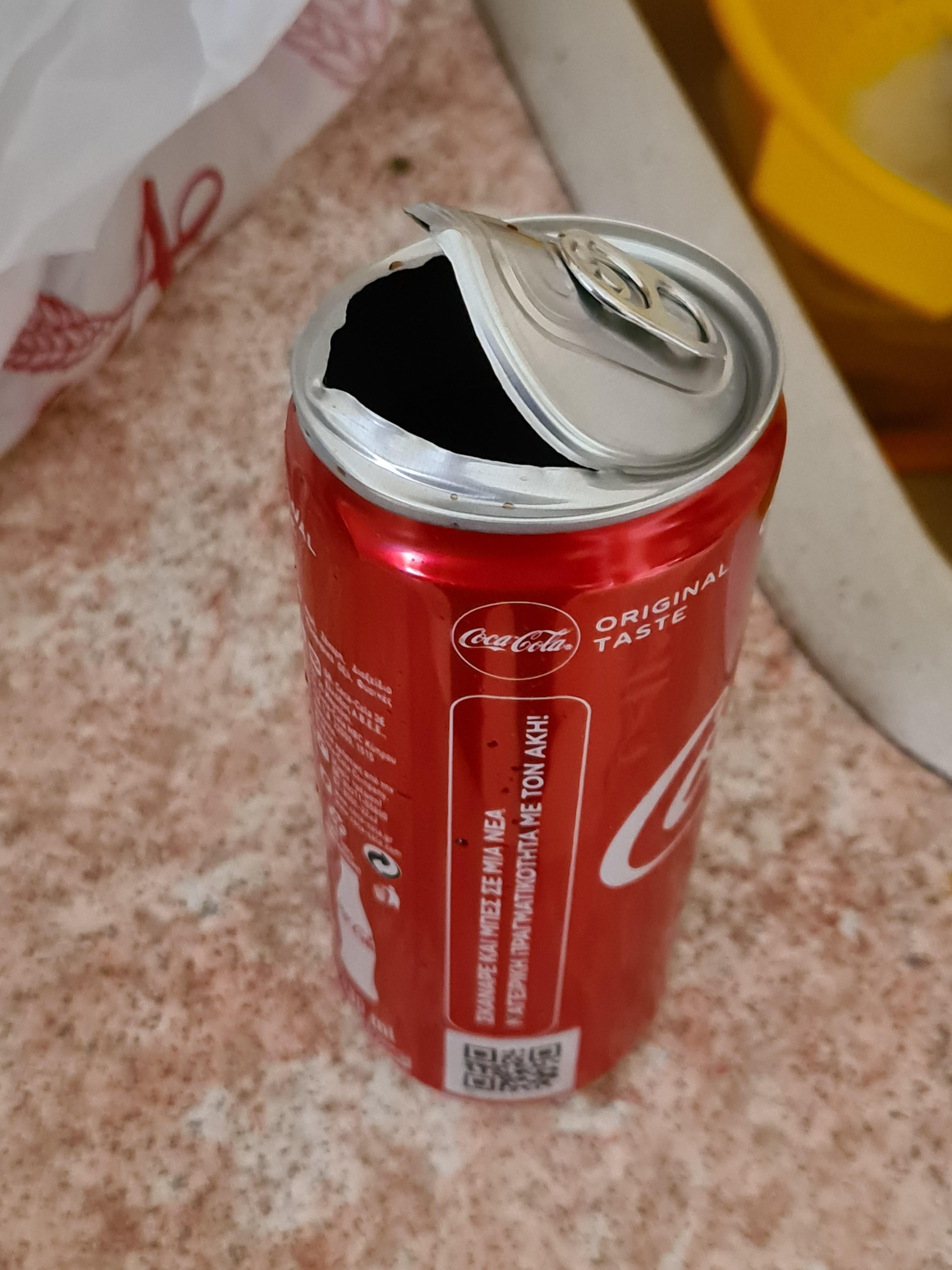 Randomly exploded can in my cabinet? anyone has any idea why, is it ...