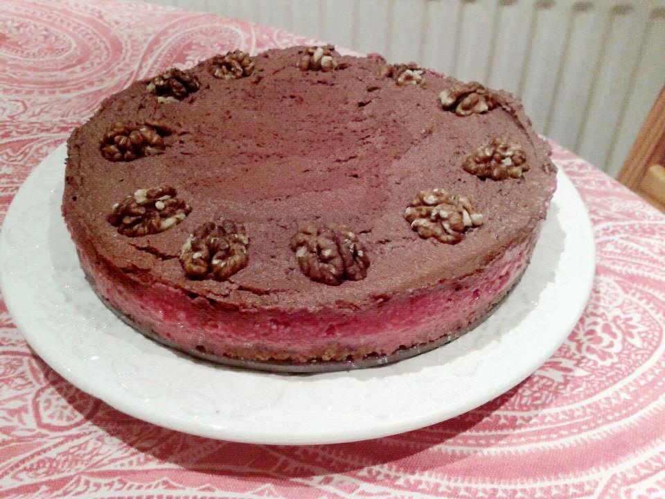 Raw vegan raspberry cake with a rich chocolate topping and 'crumble' base. | Scrolller