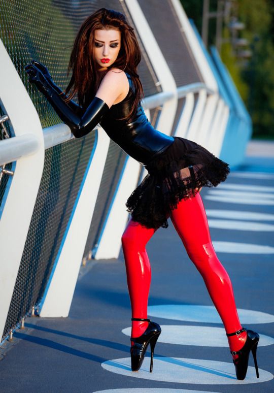Red and Black on a Bridge | Scrolller