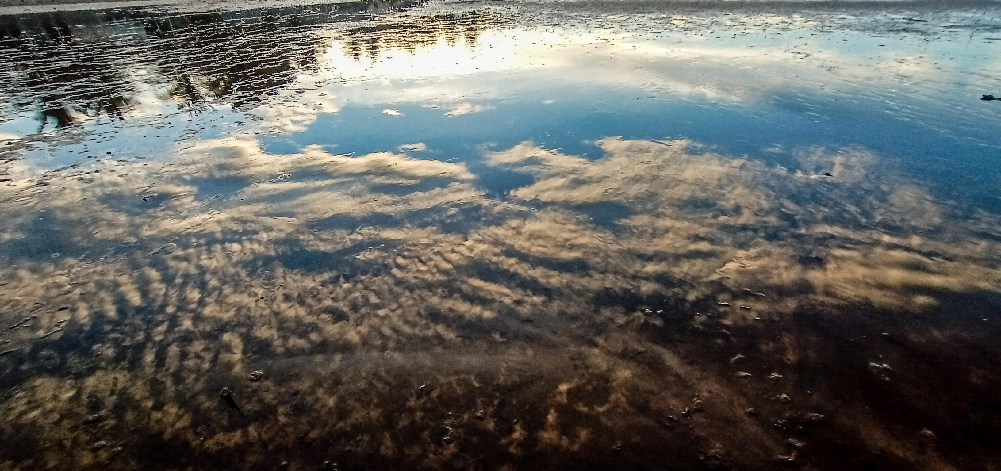 Reflection of the sky | Scrolller